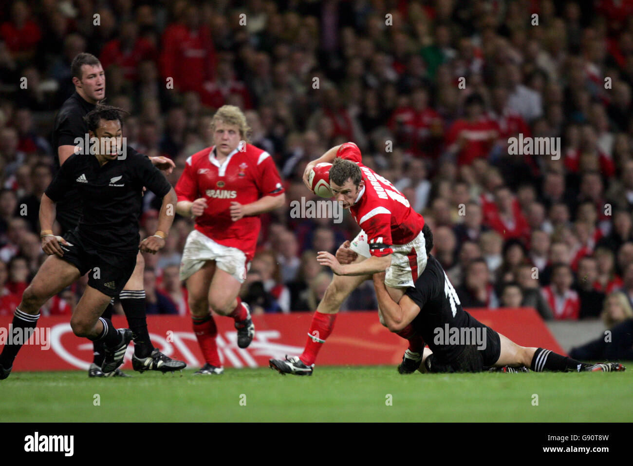 Wales' Kevin Morgan breaks through the New Zealand's defence Stock ...