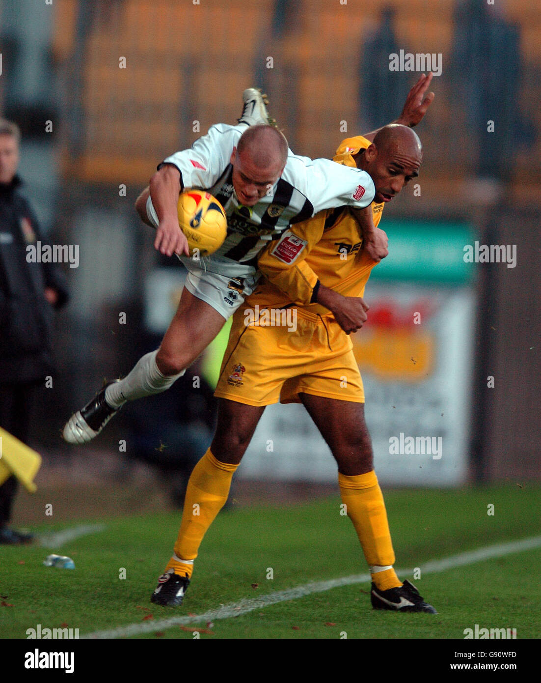 Notts County's David Pipe Cheltenham Town's Jamie Victory battle for ...