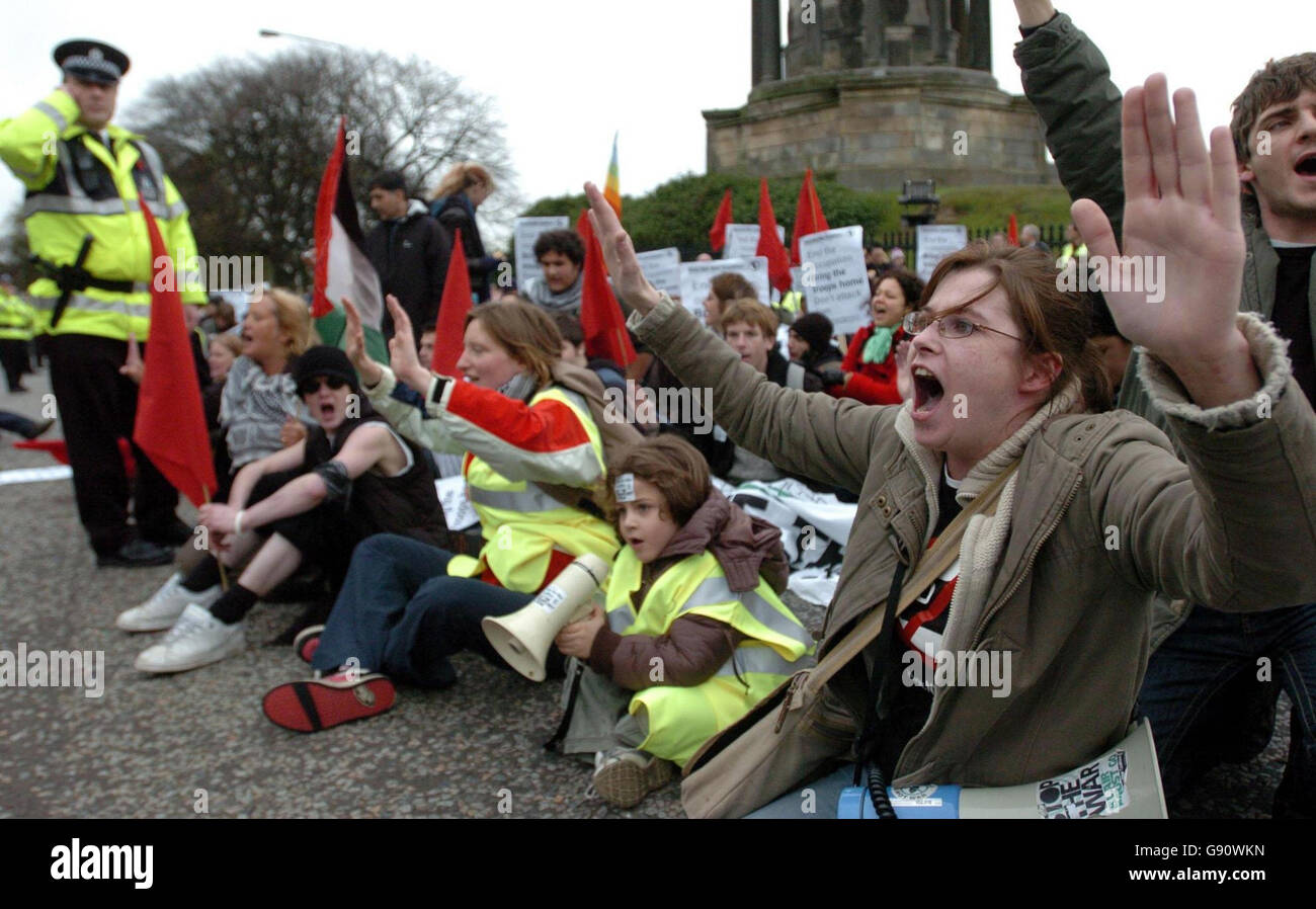 Women take part in a sit down protest near the American embassy in ...