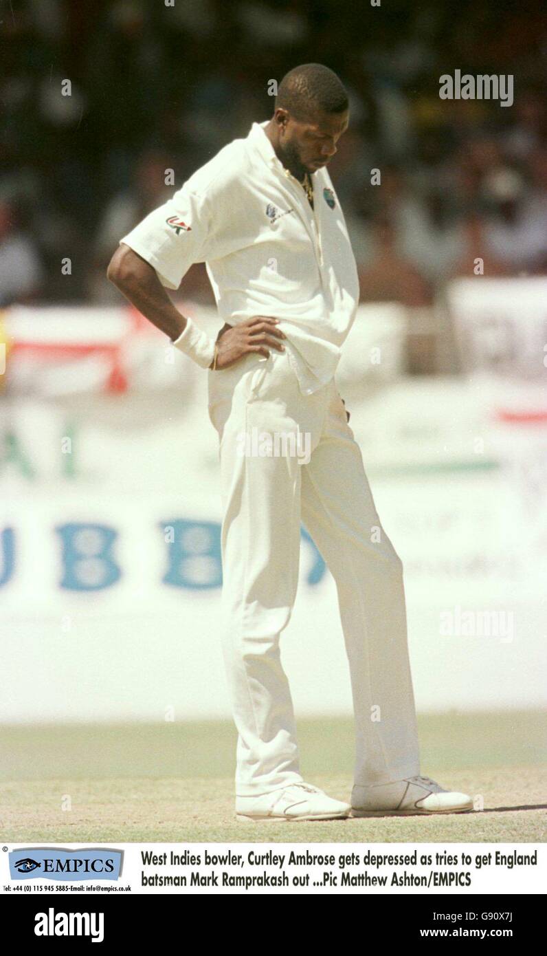 West Indies bowler Curtly Ambrose stares at the floor as he tries in ...