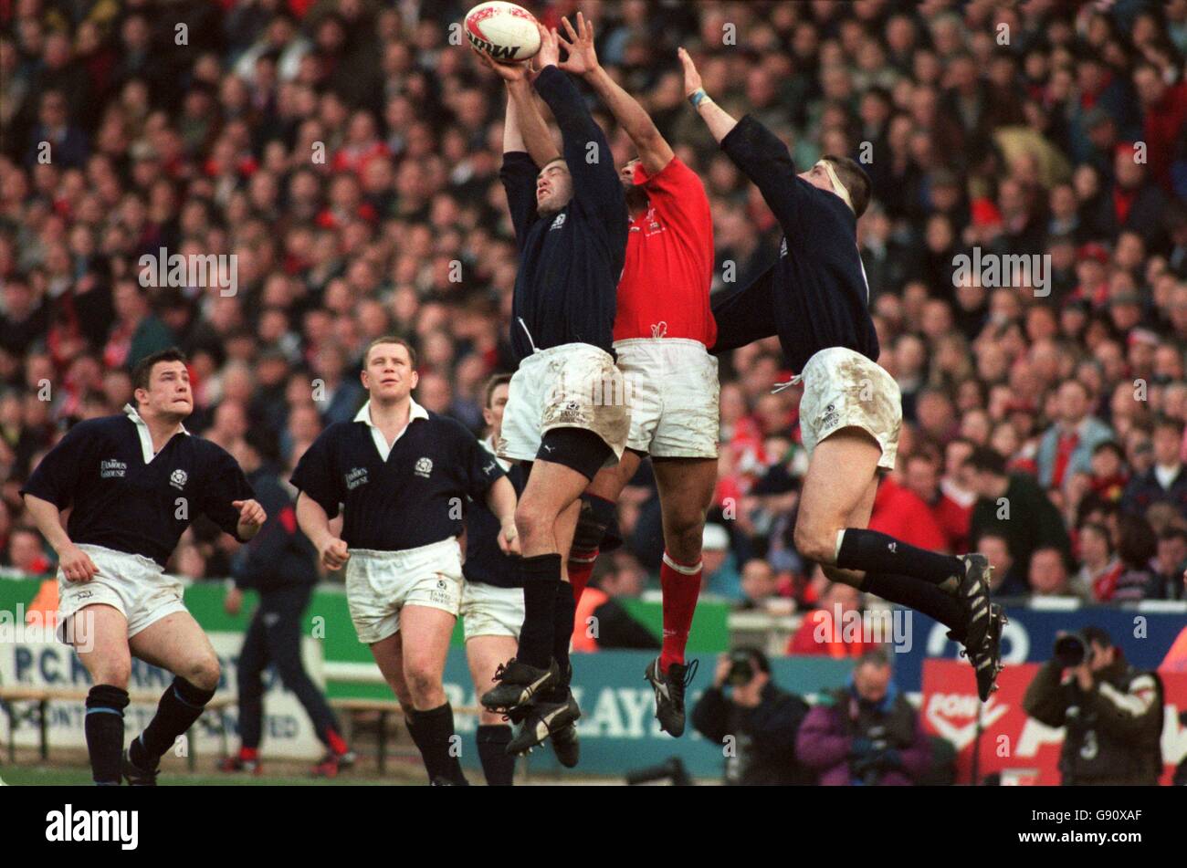 Wales' Rob Howley (Centre), Scotland's Eric Peters (L) and Rob ...