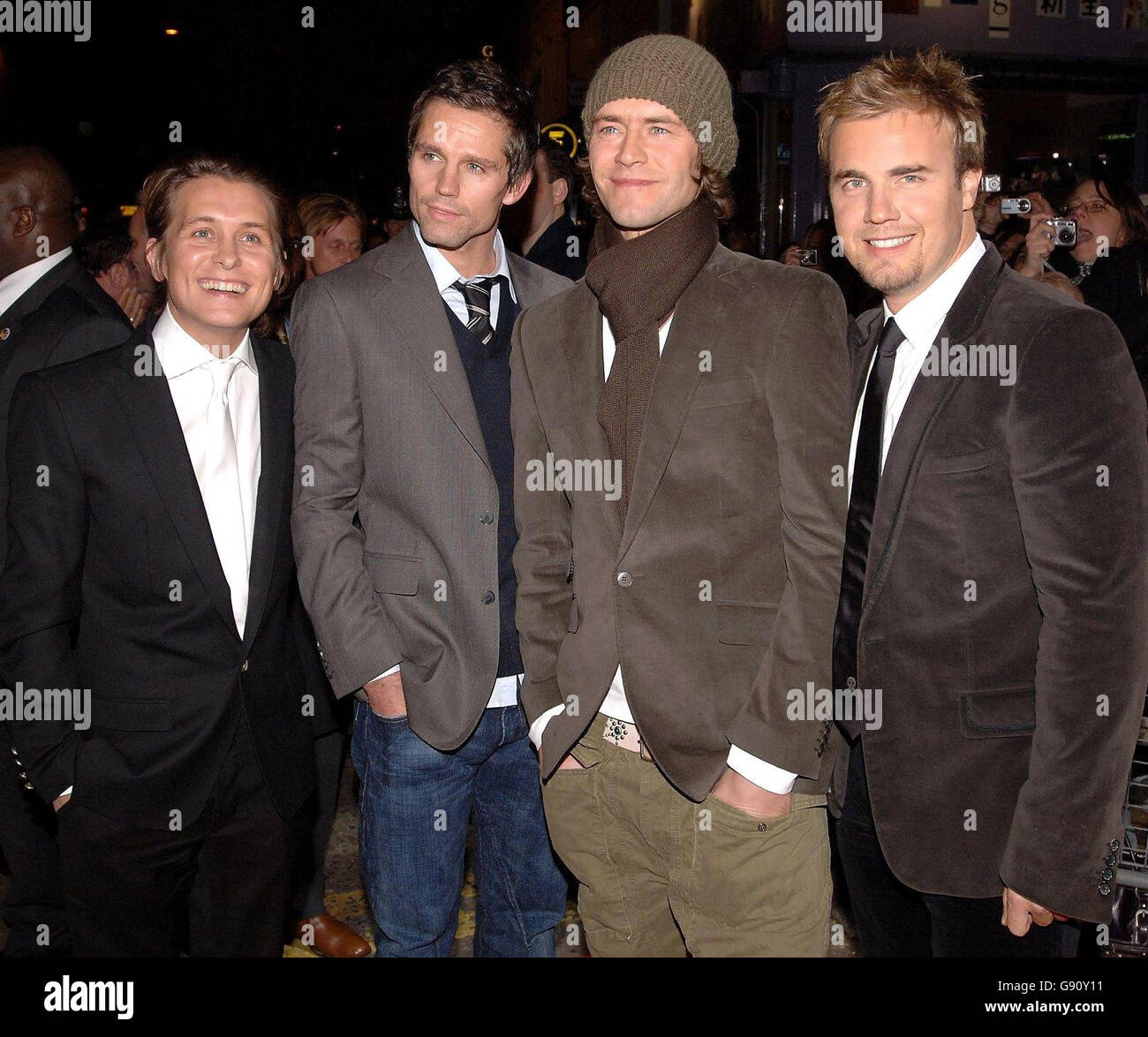 Former members of 90s boy band take that hi-res stock photography and ...