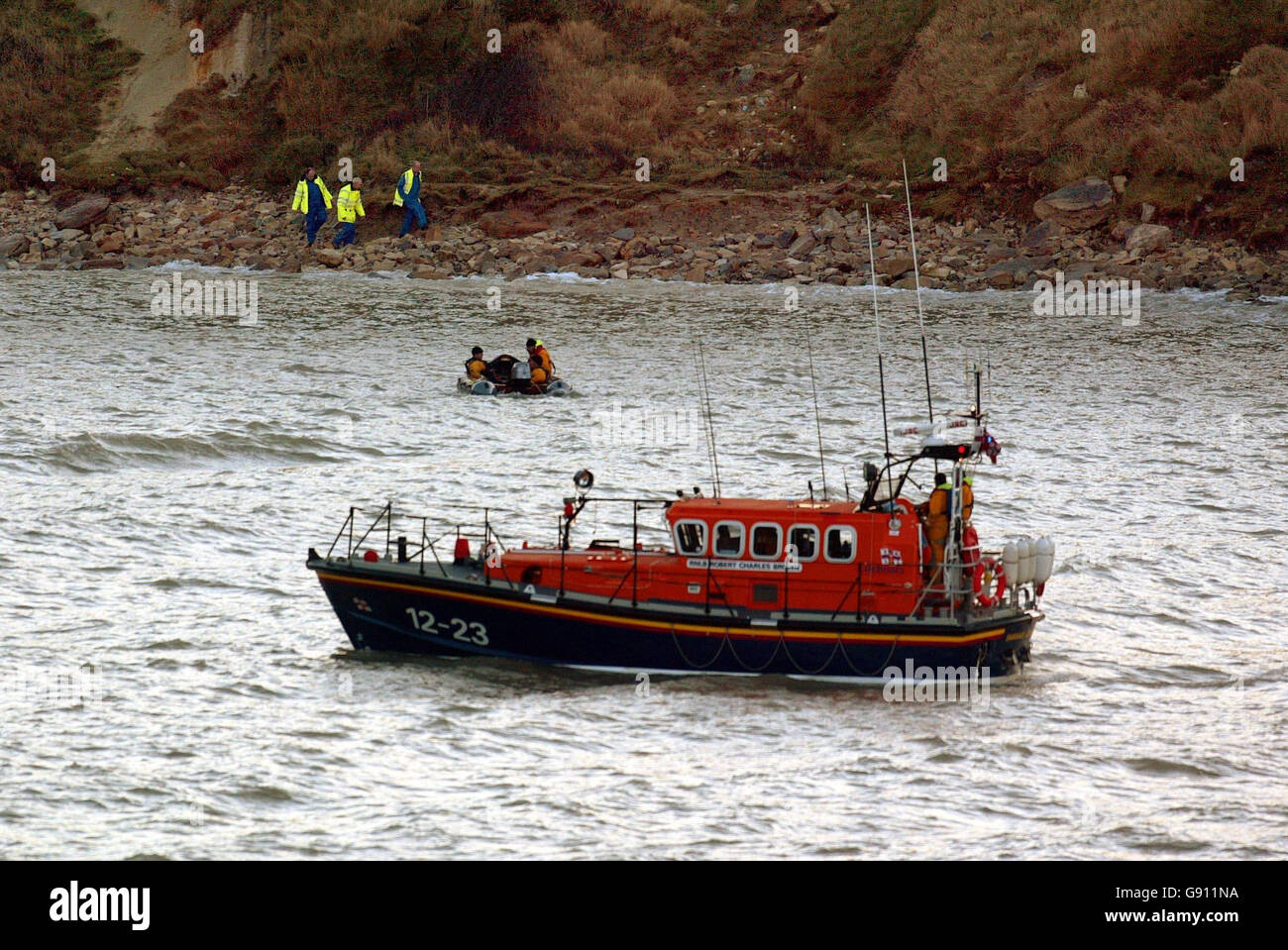 Two boys in inflatable boat hi-res stock photography and images - Alamy
