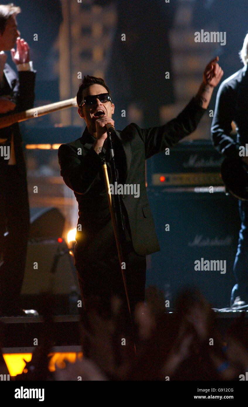 Robbie Williams appears on stage during the MTV Europe Music Awards ...