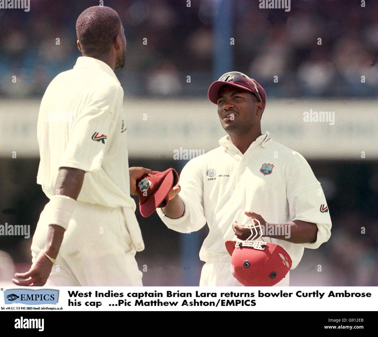 Two half white talking cap helmet hi-res stock photography and images ...