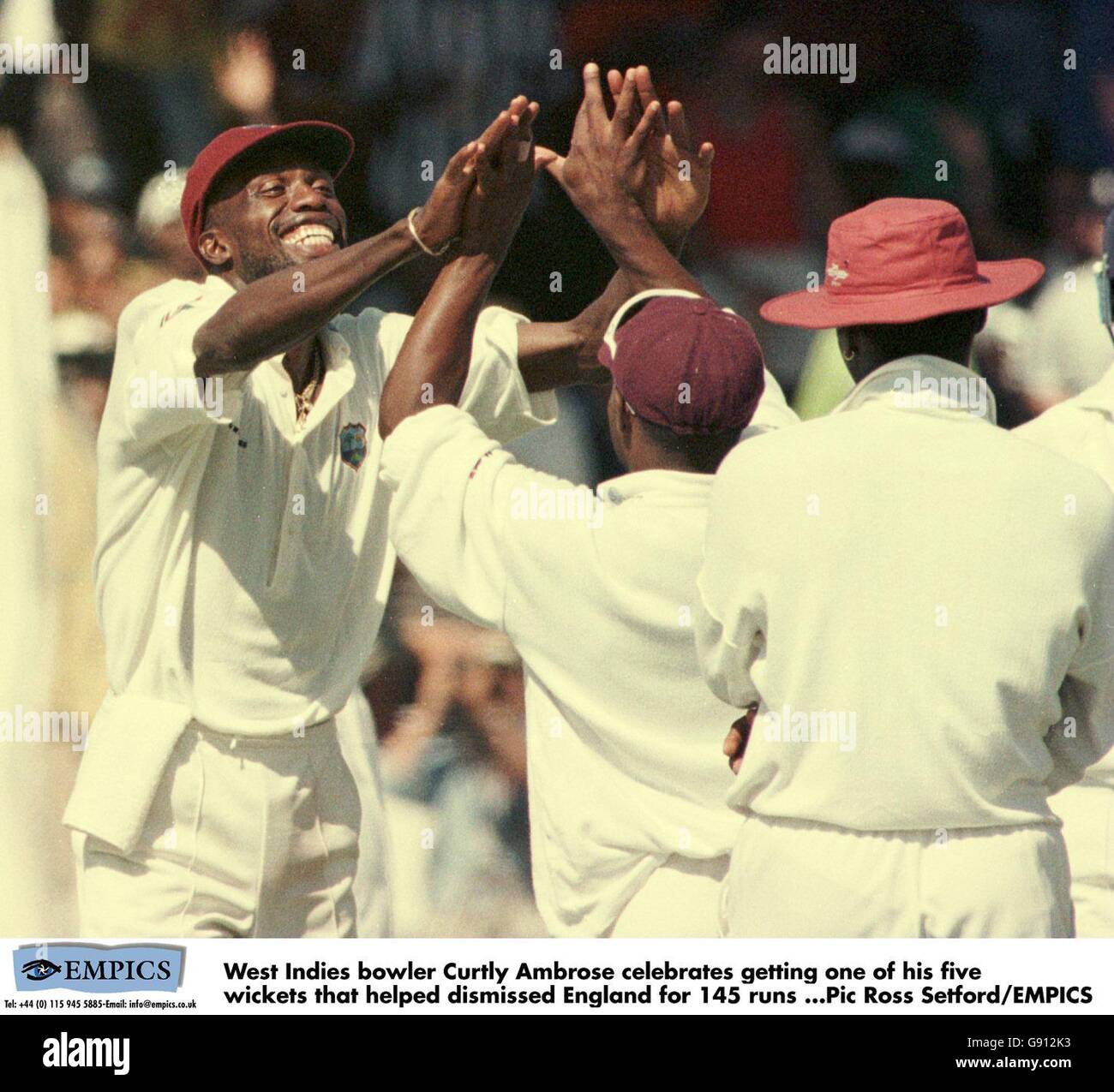 West Indies bowler Curtly Ambrose celebrates getting one of his five ...