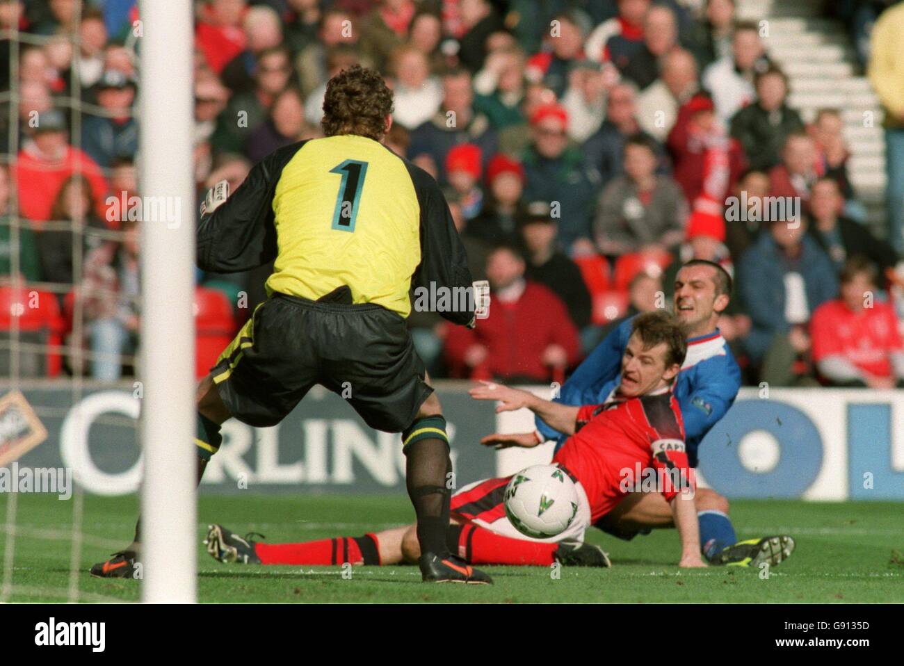 Middlesbrough's Marco Branca (R) shoots at the Nottingham Forest goal ...