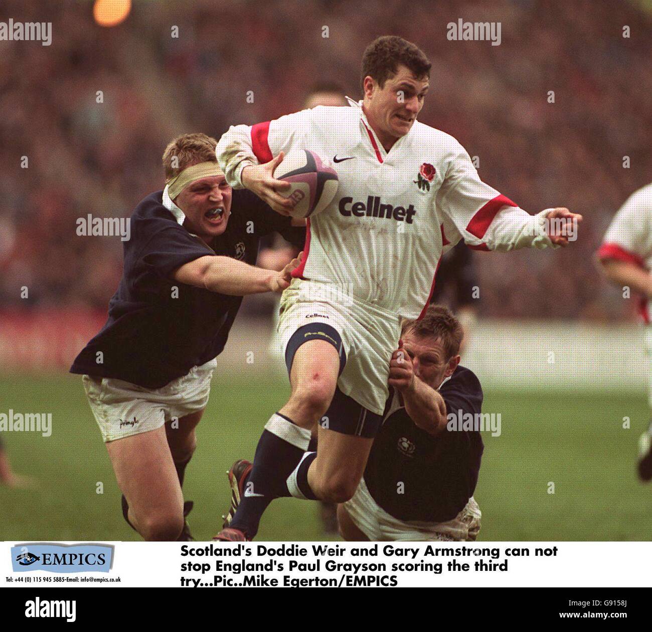 Scotland's Doddie Weir and Gary Armstrong cannot stop England's Paul ...
