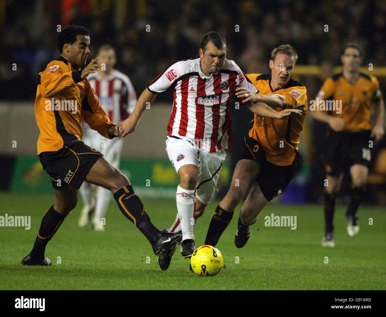 Sheffield United's Neil Shipperley barges past Wolverhampton Wanderers ...