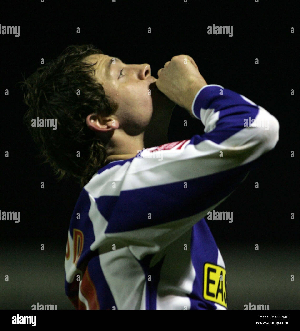 Colchester's Jamie Cureton celebrates scoring during the Coca-Cola ...