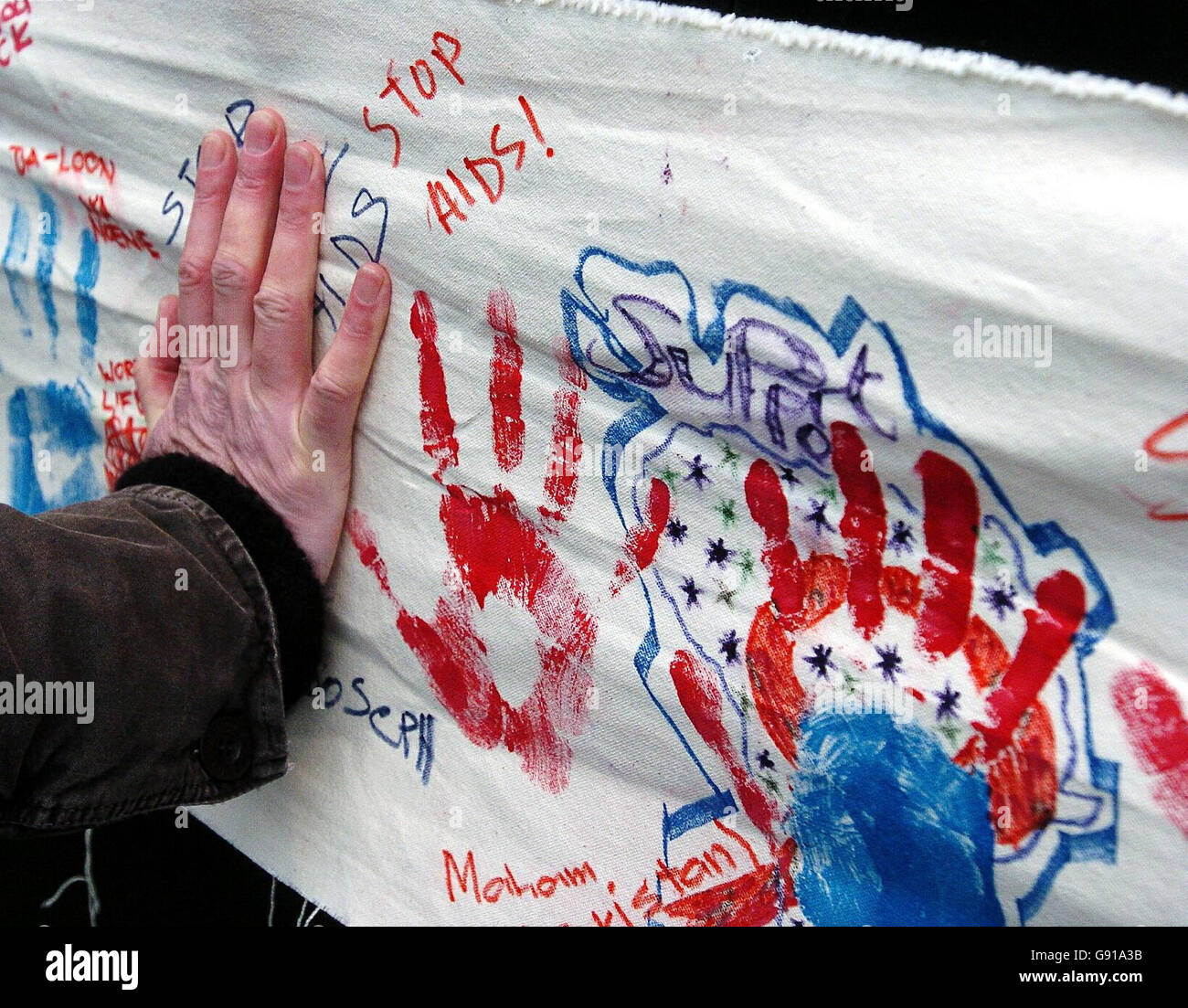 Rainbow handprints hi-res stock photography and images - Alamy