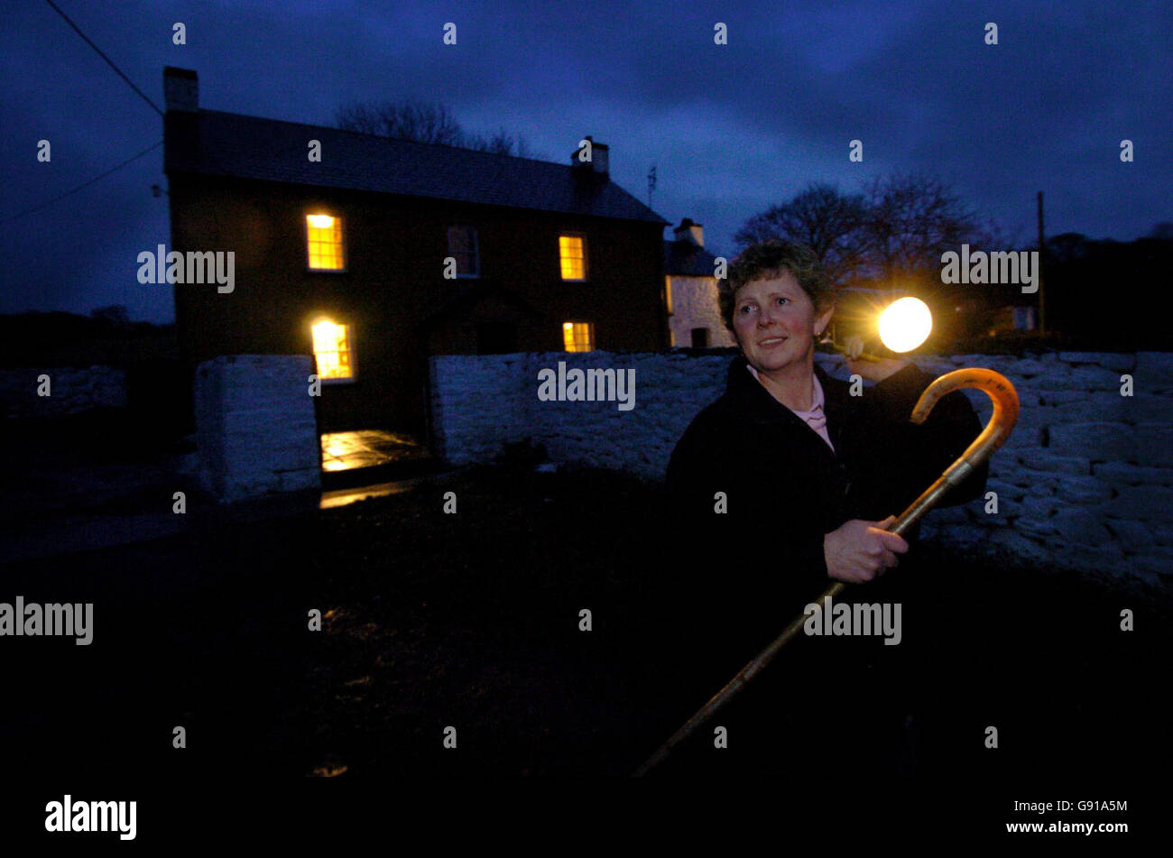 Light floods out of her newly electrified home as Jean Llewellyn sets ...
