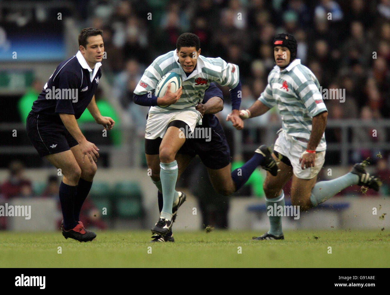 Cambridge's Joseph Ansbro is tackled by Oxford's Ali James during the ...