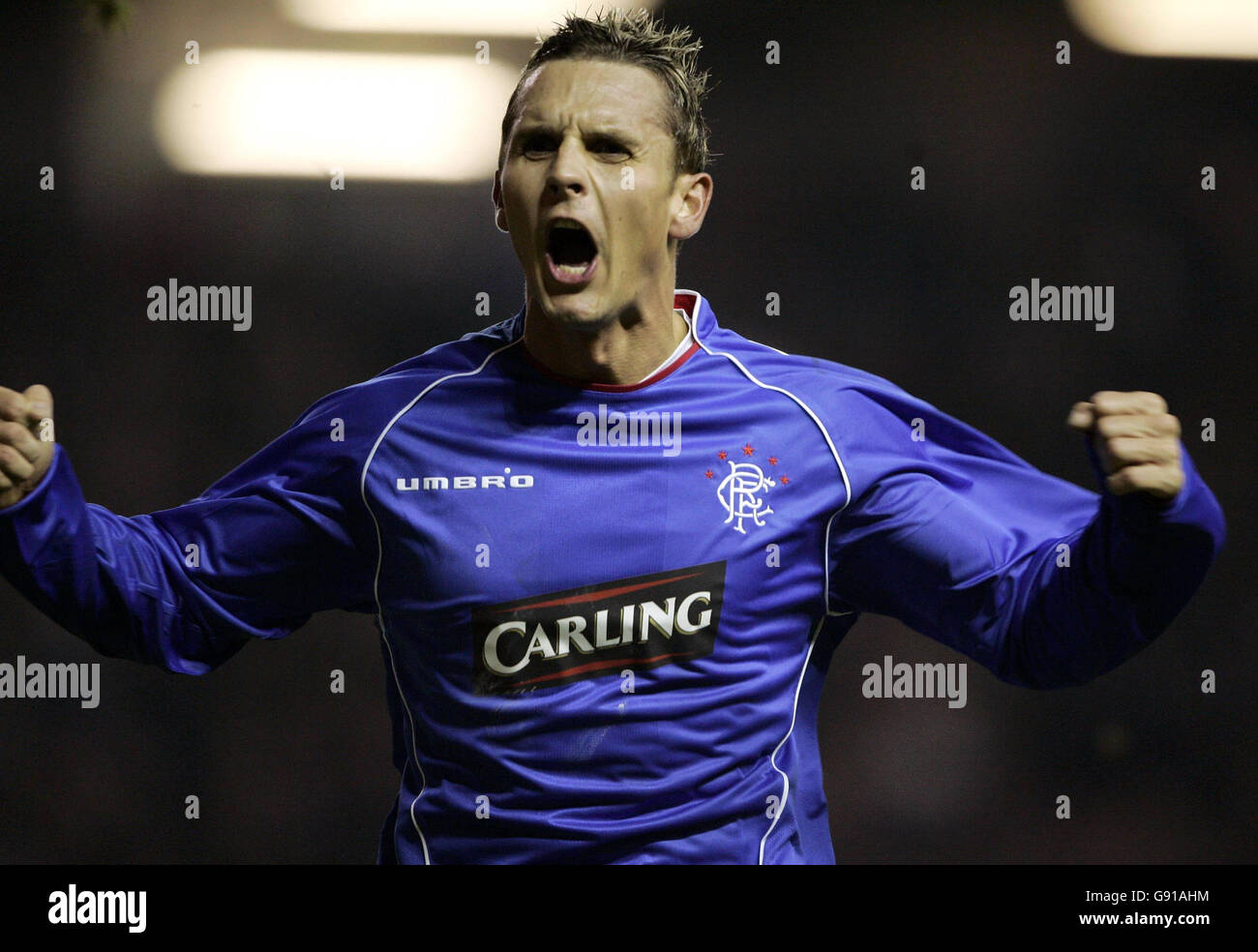 Rangers' Peter Lovenkrands celebrates scoring against Inter Milan ...