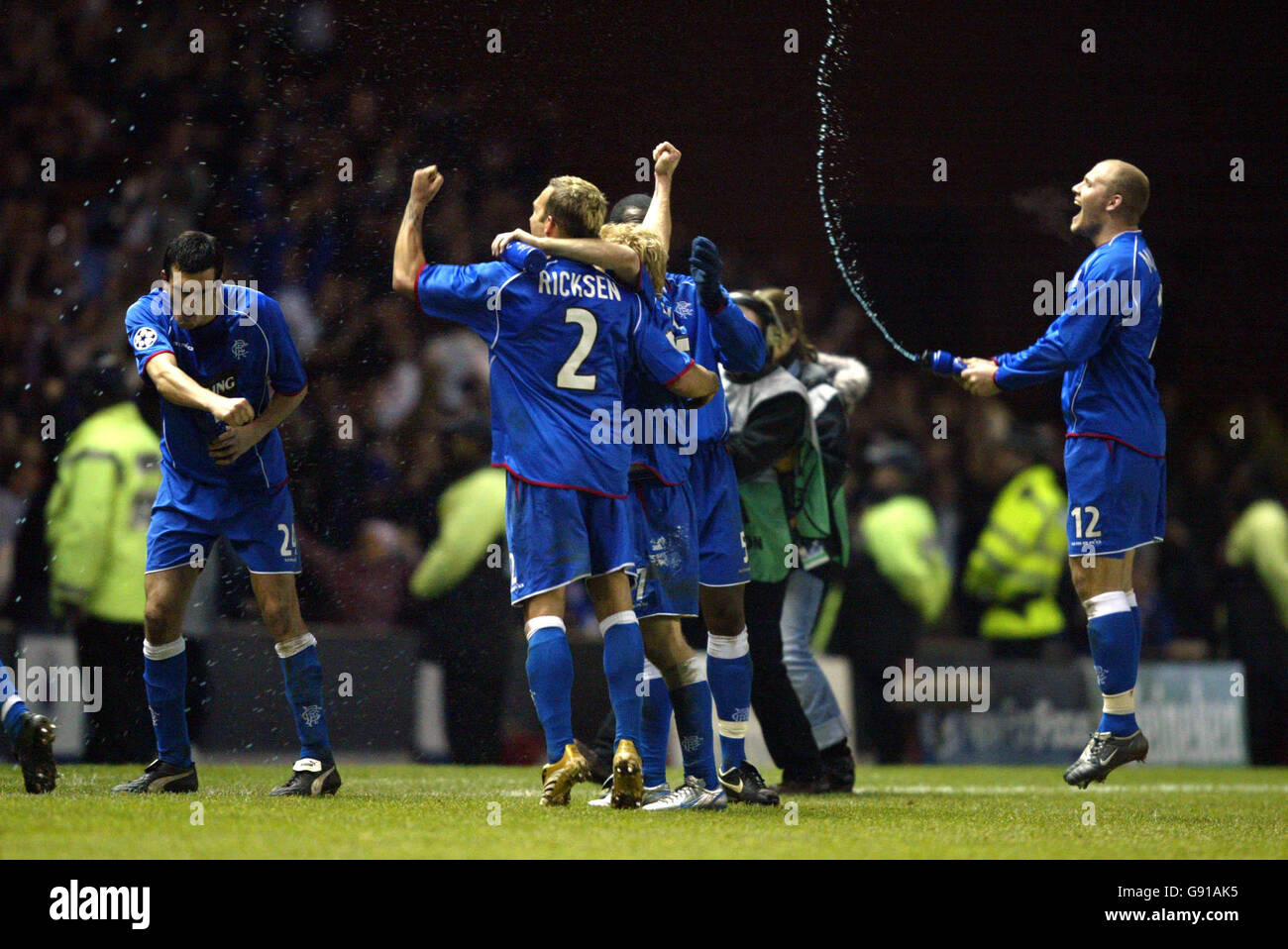Rangers' Robert Malcolm (r) Fernando Ricksen (c) and Ian Murray (l ...