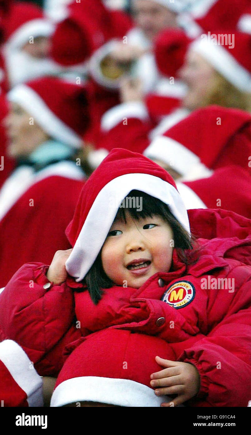 Santas gather in princes street gardens hi-res stock photography and ...