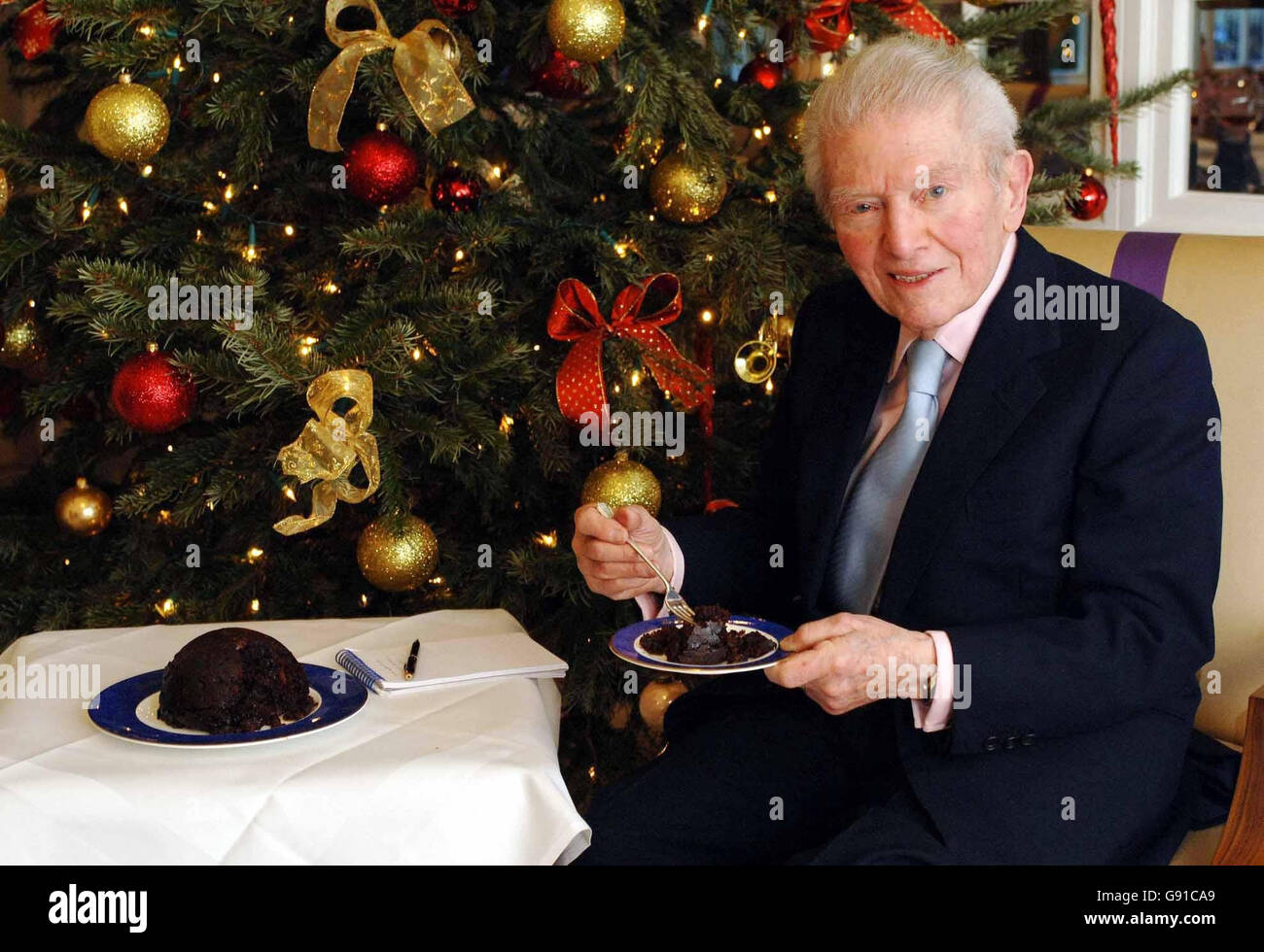 Egon Ronay blind tastes one of several Christmas puddings at the Goring ...