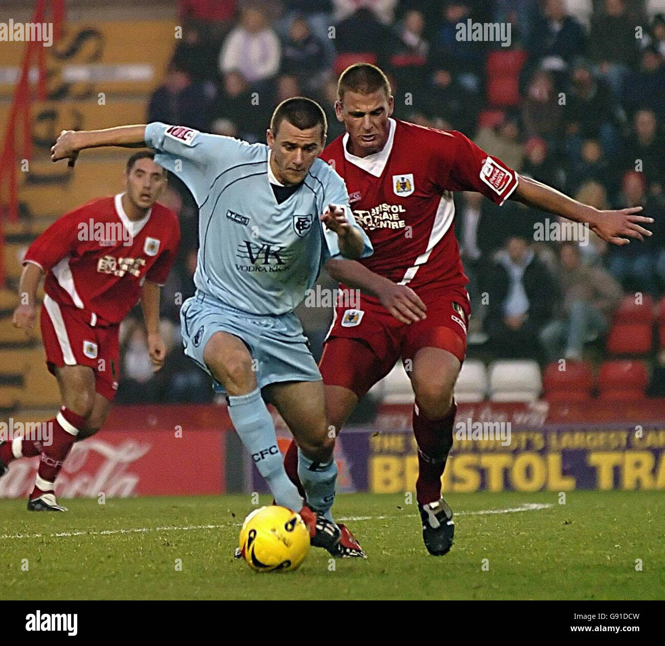 Chesterfield's Colin Larkin (L) battles with Bristol City's Scott Brown ...