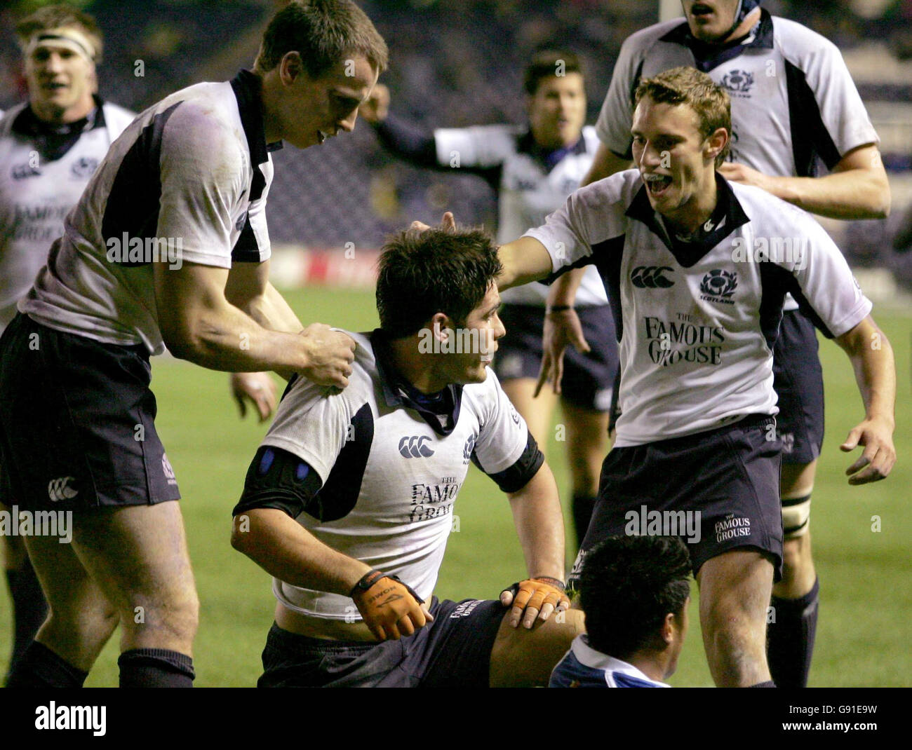 Scotland's Marcus Di Rollo (C) celebrates his try against Samoa, with ...