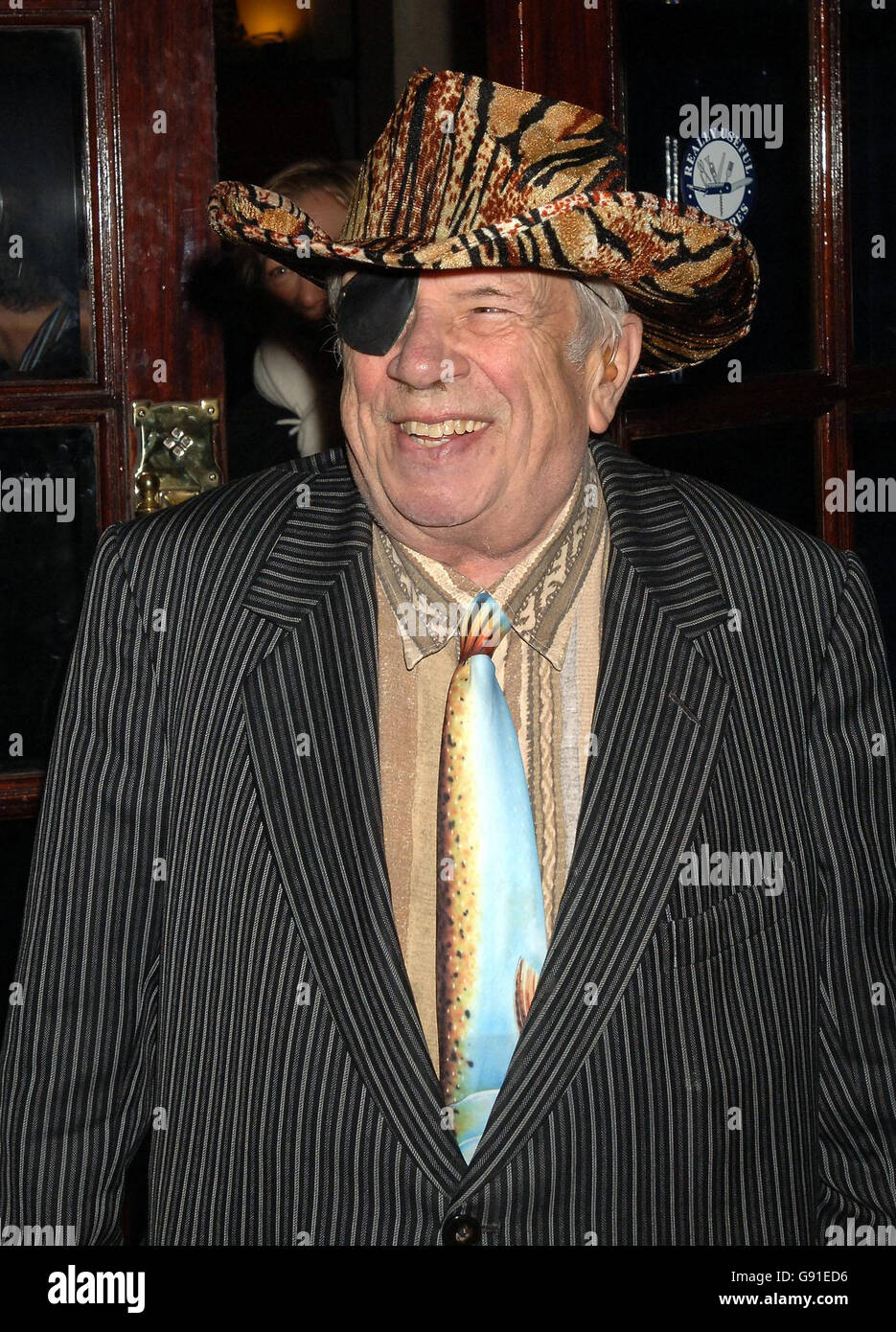 Jazz singer George Melly arrives at the Theatre Royal Drury Lane, for a ...