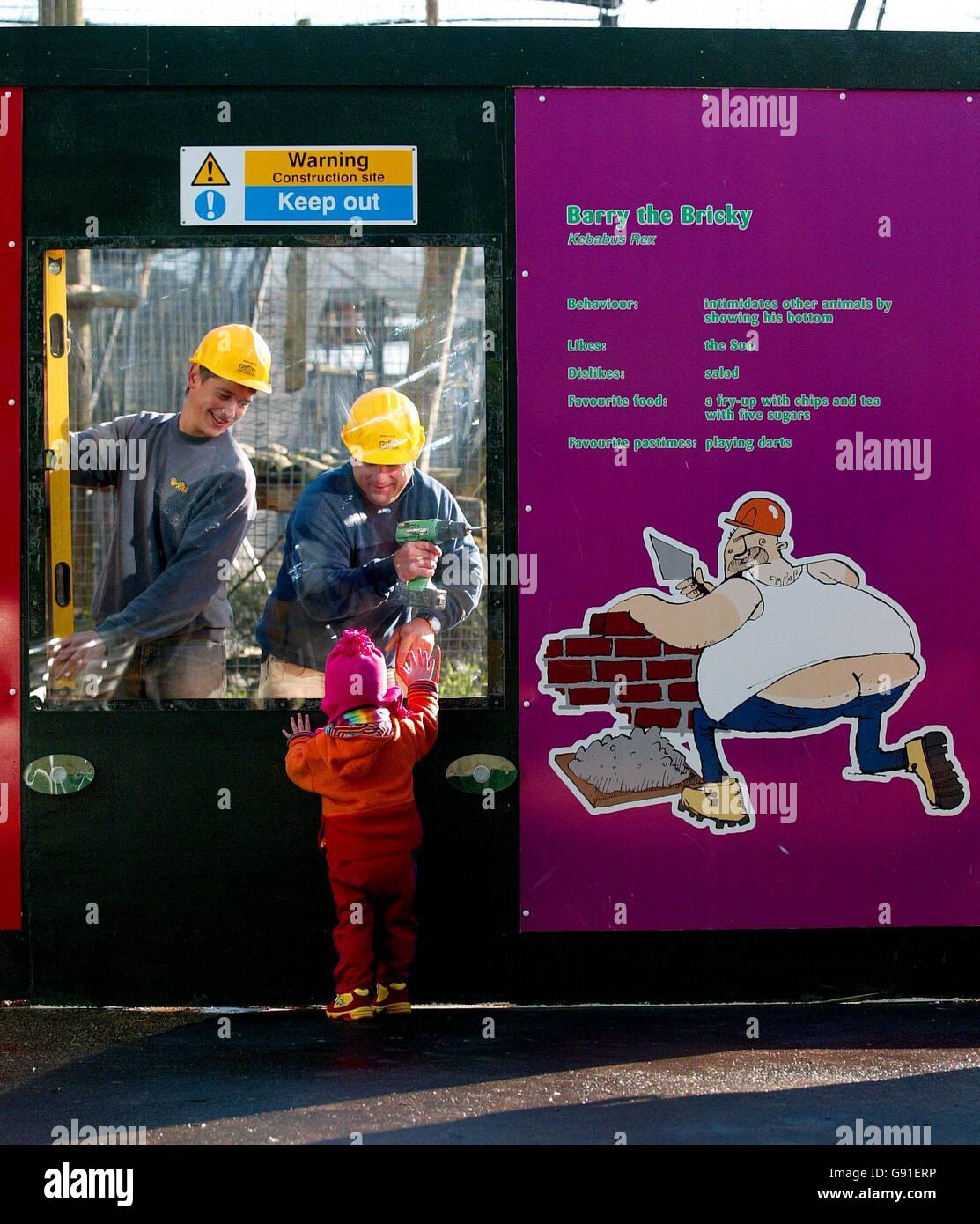 Two year old Ischia Day watches as site foreman Adrian Pugh and ...