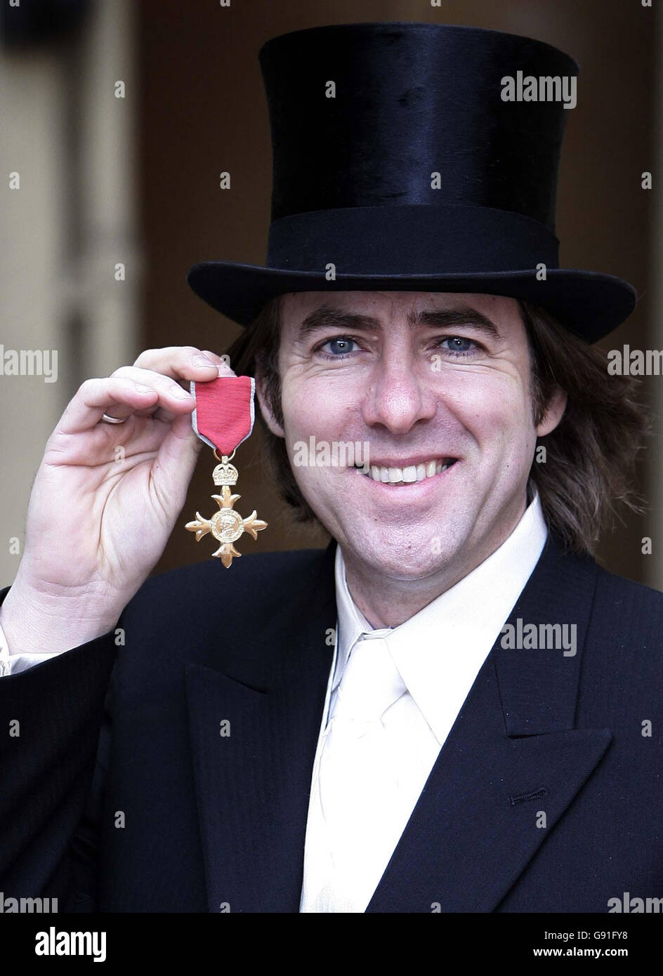 TV presenter Jonathan Ross after receiving his OBE at Buckingham Palace ...