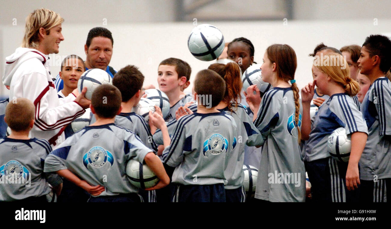 England football captain David Beckham talks to children during the ...