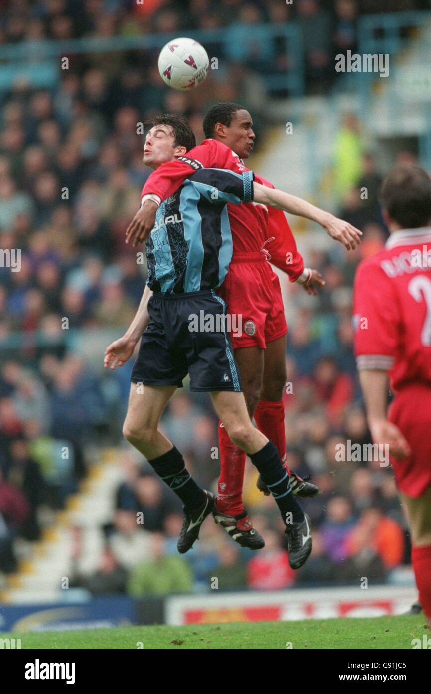 Gary Breen of Coventry City (left) and Liverpool's Paul Ince (right) go ...