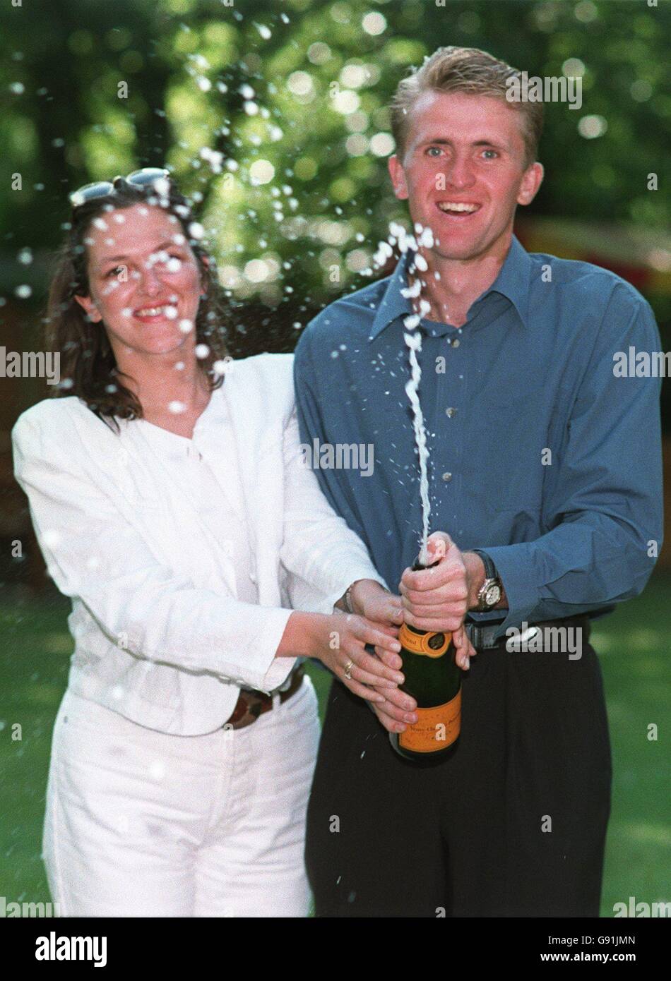 Englands dominic cork celebrates his seven wickets with his wife hi-res ...