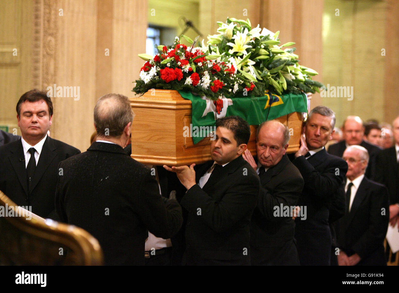 George Best's coffin is carried into the Parliament Buildings in ...