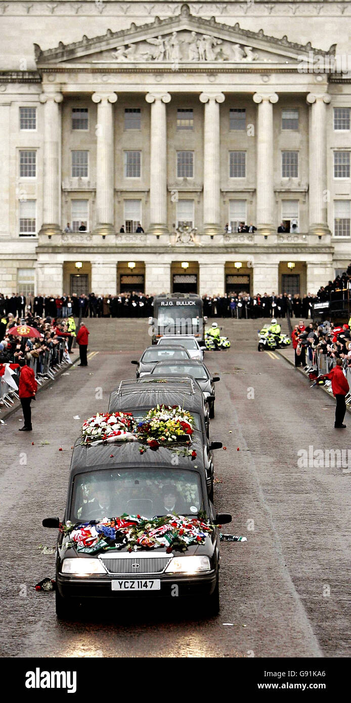 The funeral procession for george best leaves stormont hi-res stock ...