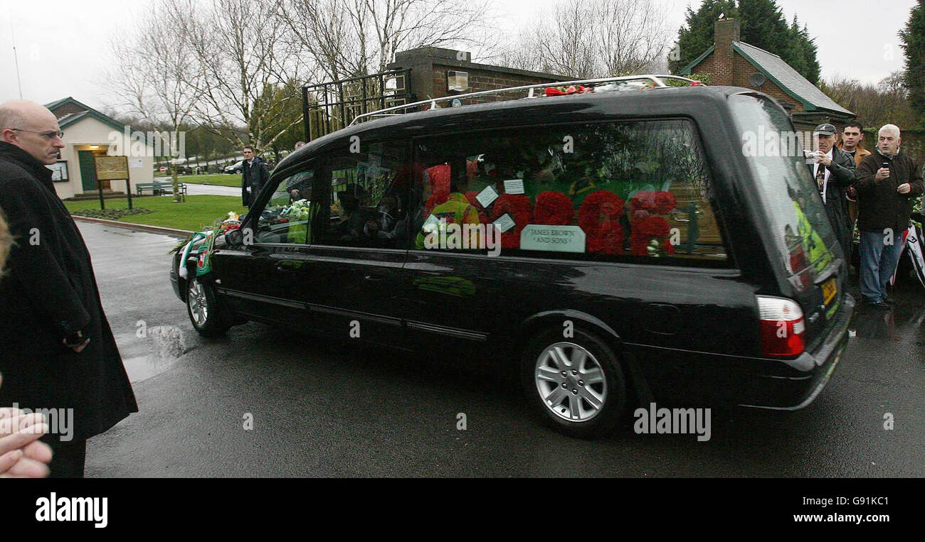 The funeral cortege of George Best enters Roselawn cemetary in ...