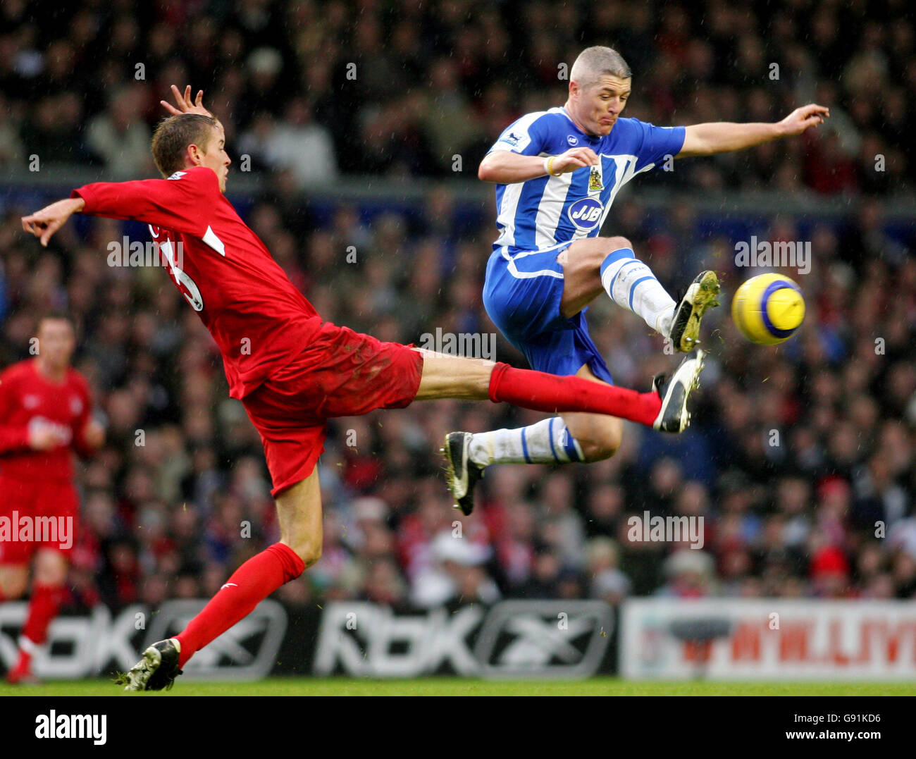 Wigan athletic l battle for the ball hi-res stock photography and ...