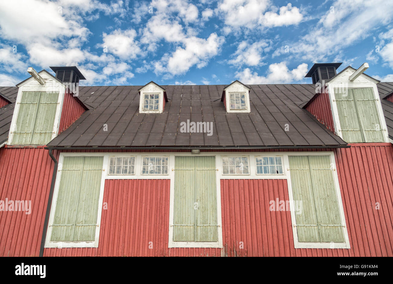 Old Stable Building with a partly cloudy sky Stock Photo - Alamy