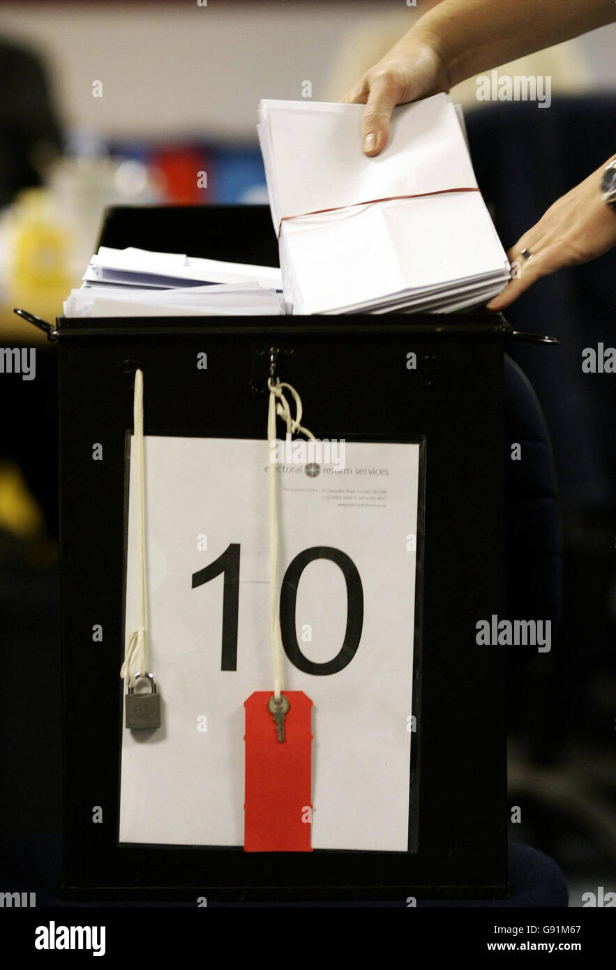 Ballot papers are placed in a ballot box hi-res stock photography and ...