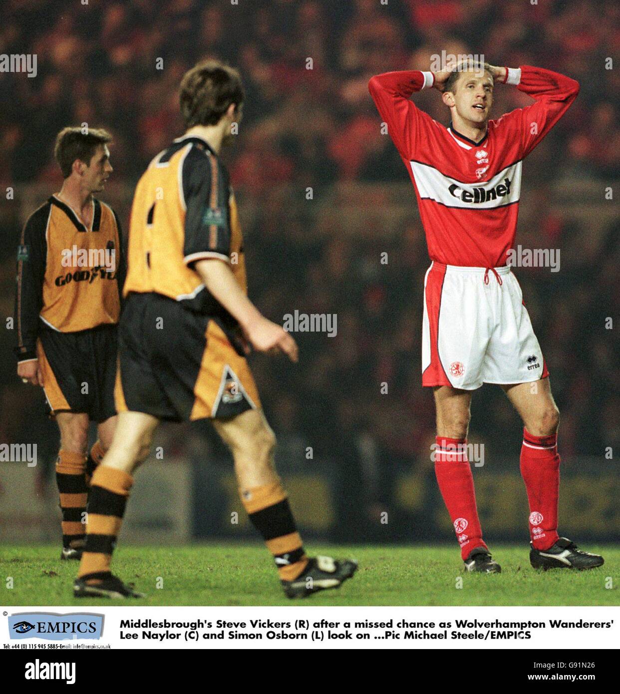 Middlesbrough's Steve Vickers (R) holds his head after a missed chance ...