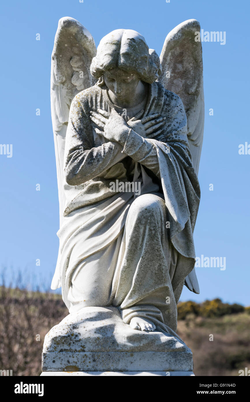 Winged Angel headstone at St Tudno's Church cemetery on the Great Orme ...