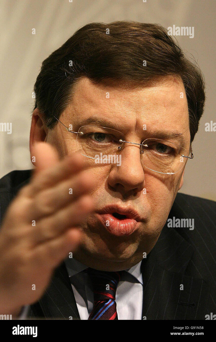 Irish Finance Minister Brian Cowan speaking to the media after ...