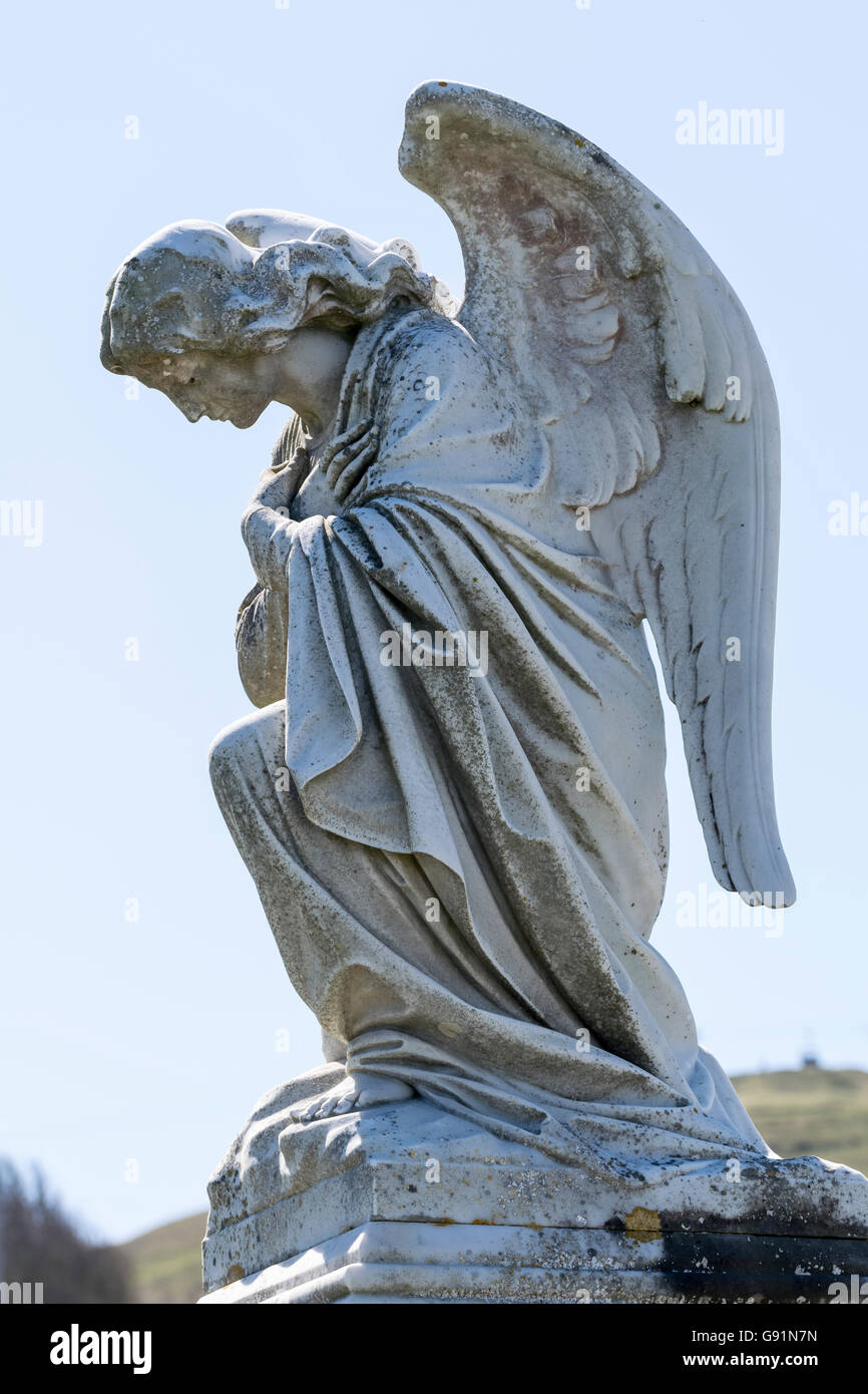Winged Angel headstone at St Tudno's Church cemetery on the Great Orme ...