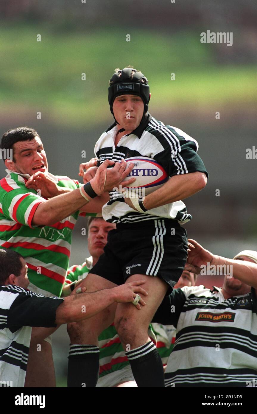 Newcastle's Garath Archer catches a line out ball from Leicester's ...