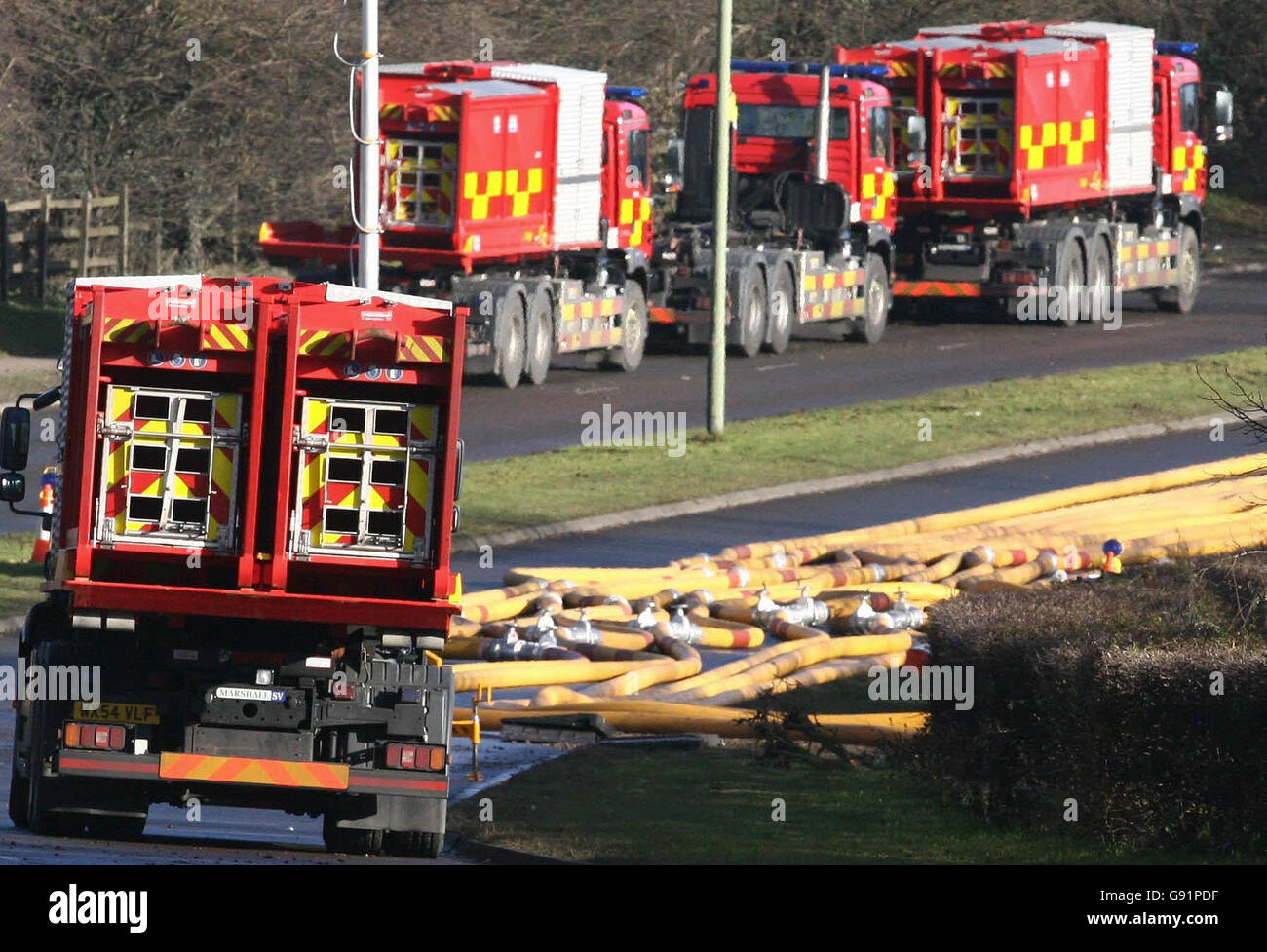 A firefighters at the buncefield oil depot in hemel hempstead hi-res ...