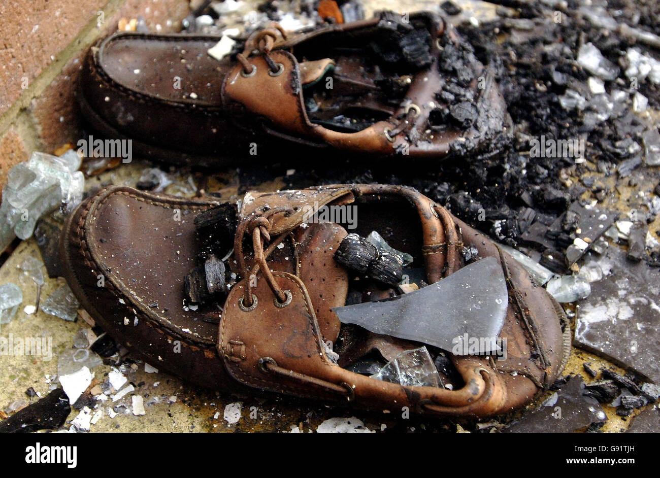 A pair of fire damaged shoes on the patio of the house in Hayes ...