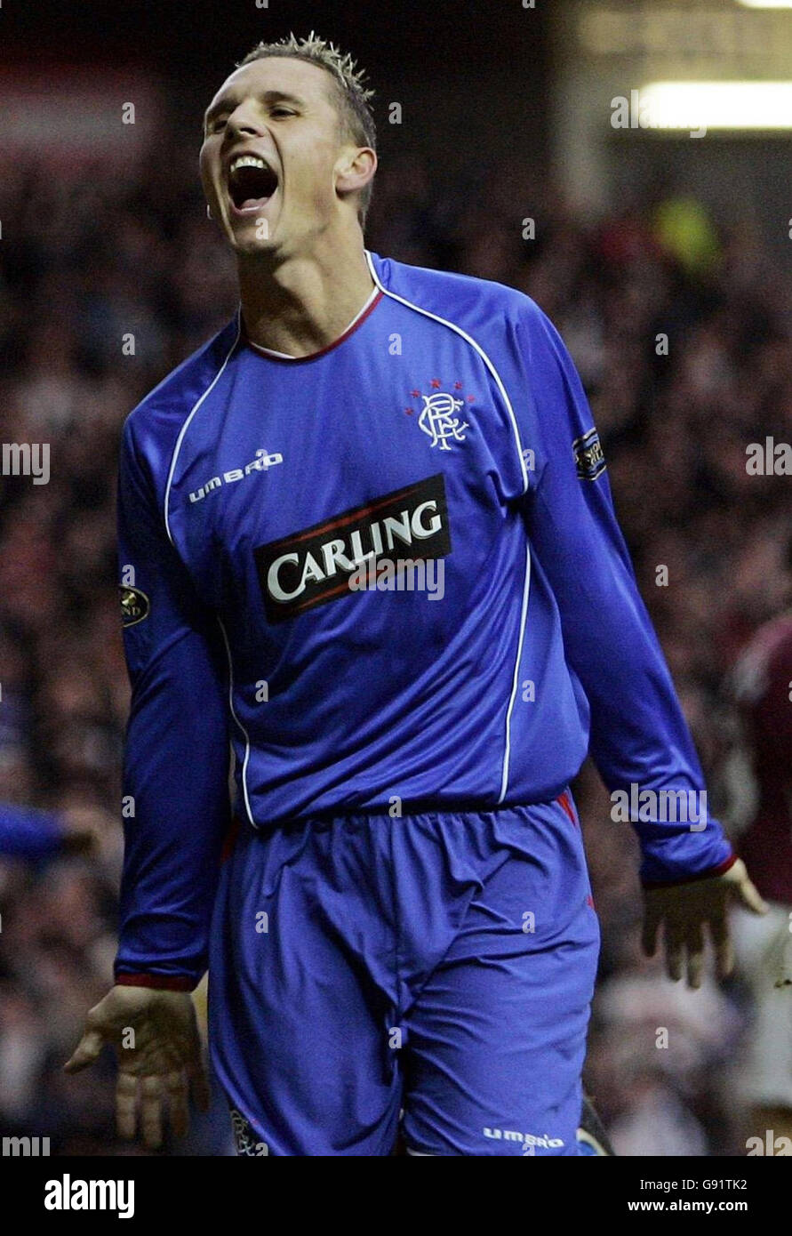 Rangers' Peter Lovenkrands celebrates scoring against Hearts during the ...