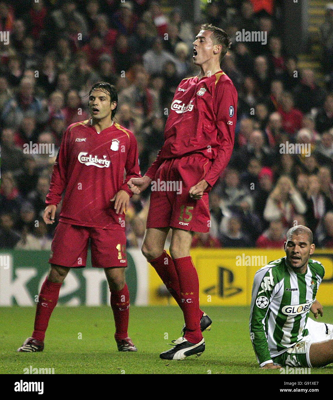 Liverpool's Peter Crouch (C) shows his dejection after another missed ...