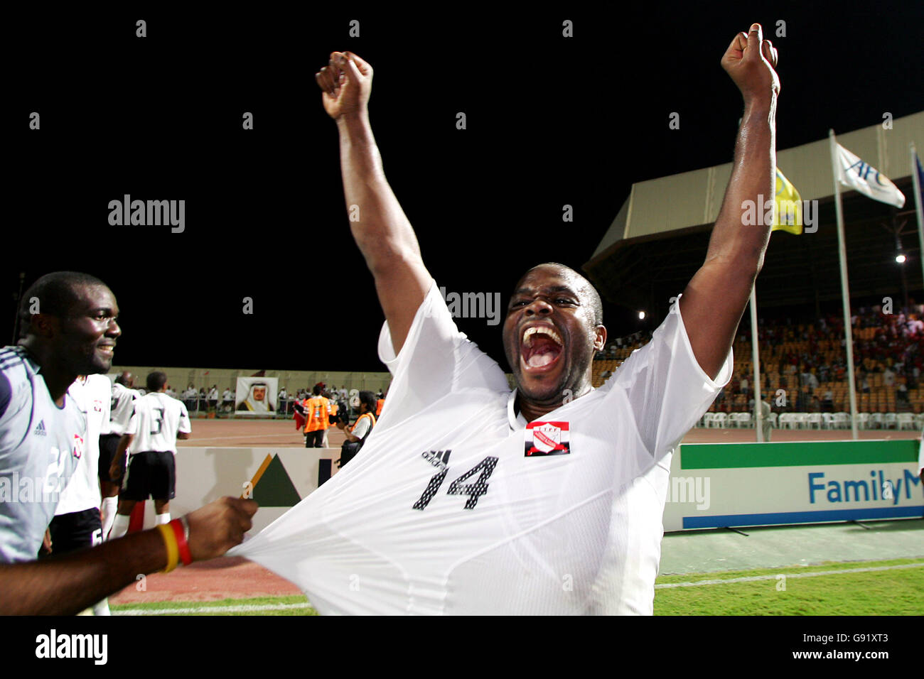 Trinidad and Tobago's Stern John celebrates his teams qualification ...