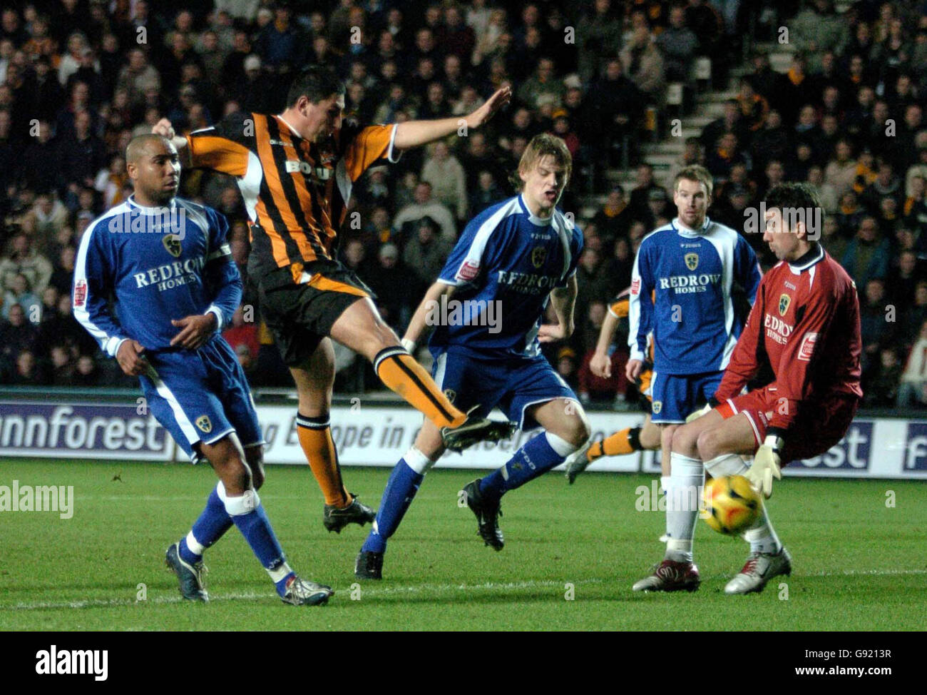 Hull's Billy Paynter (C) scores past past Cardiff's goalkeeper Neil ...