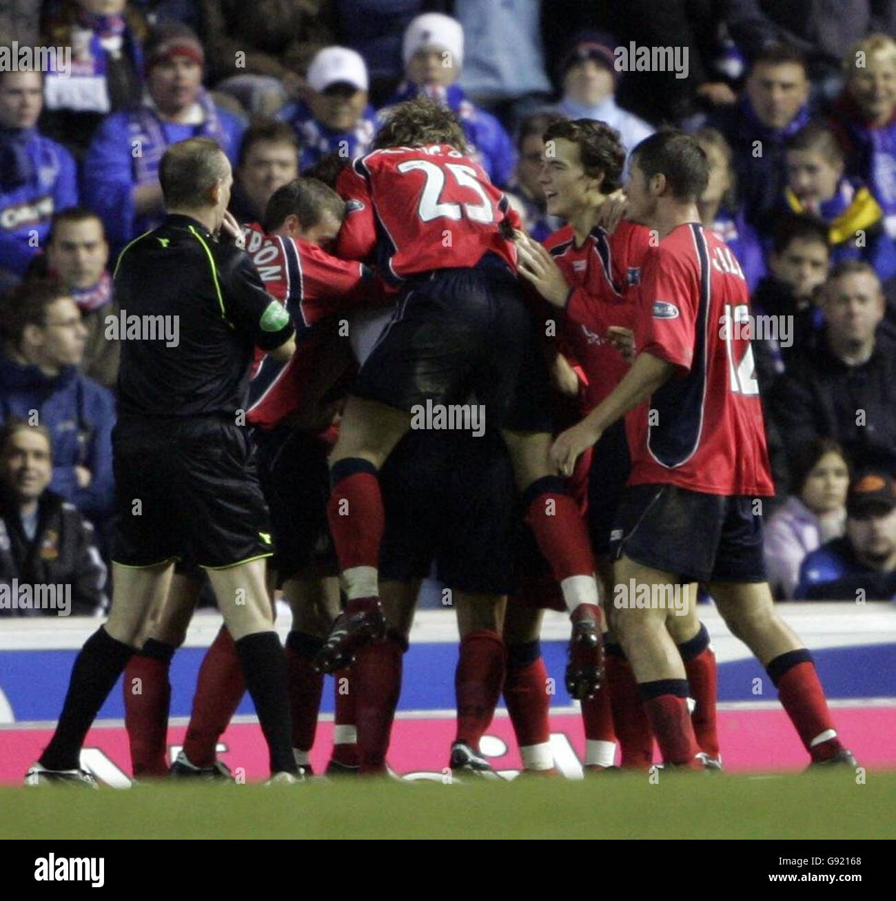 Glasgow rangers players celebrate goal hi-res stock photography and ...