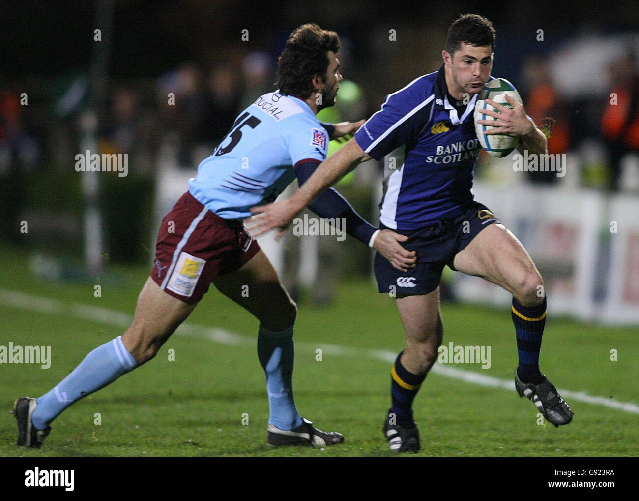 Leinster's Rob Kearney evades Bourgoin's Alexander Peclier on his way ...