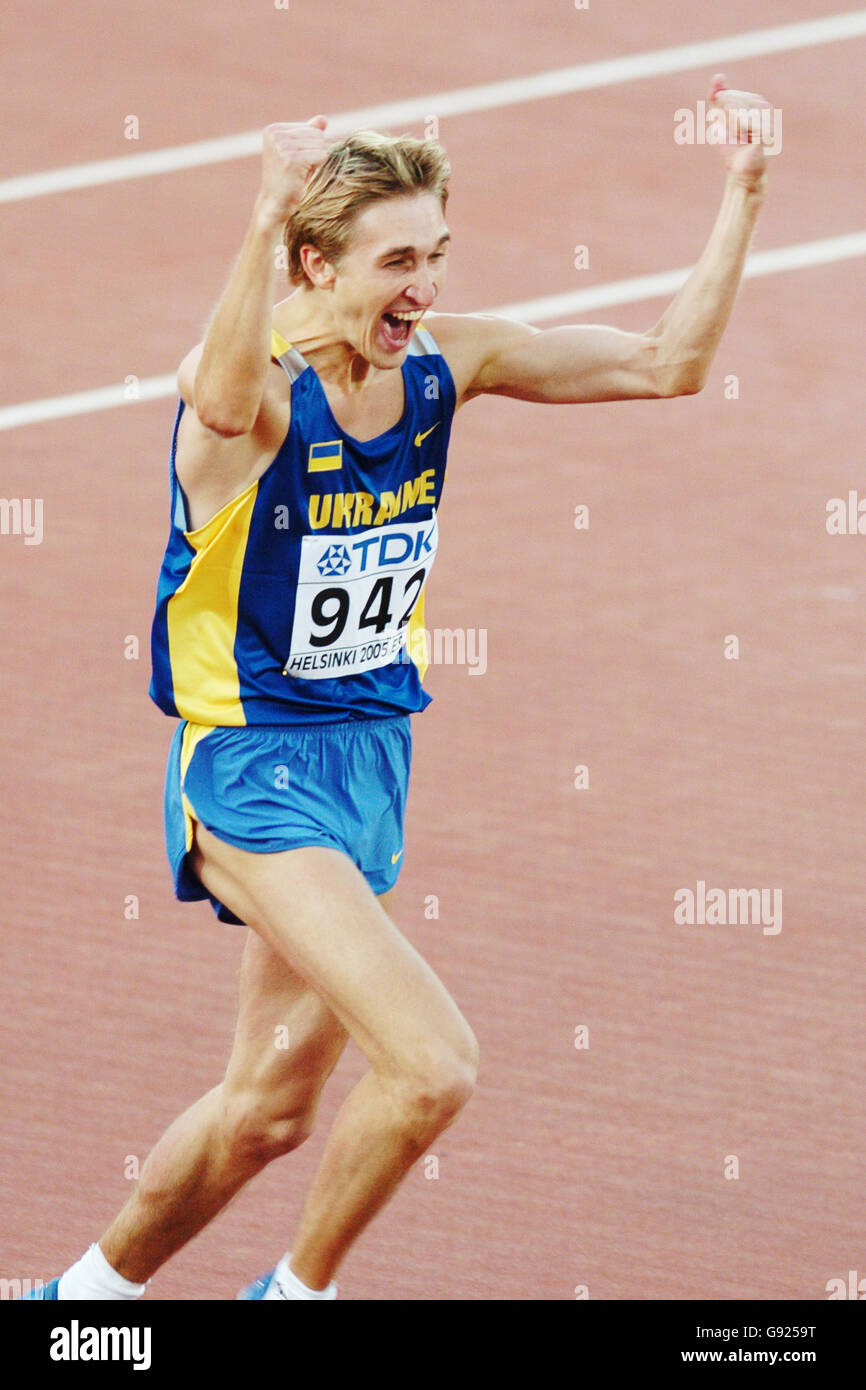 Ukraines yuriy krymarenko celebrates winning the high jump final hi-res ...