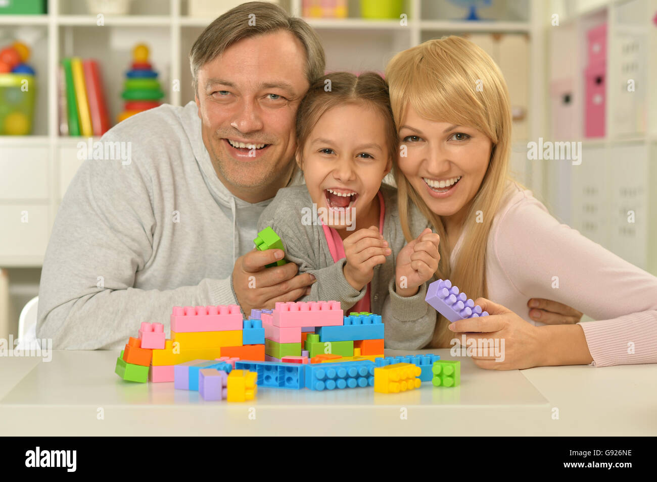 happy family playing at home Stock Photo - Alamy